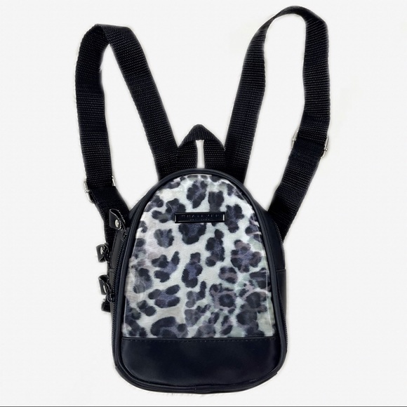 Bags | Holographic Cheetah Print Mini Backpack | Poshmark